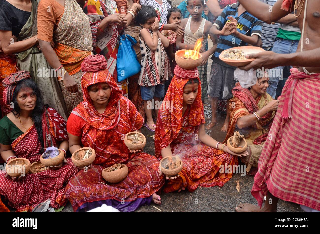 fire on head its called dhuni Stock Photo - Alamy