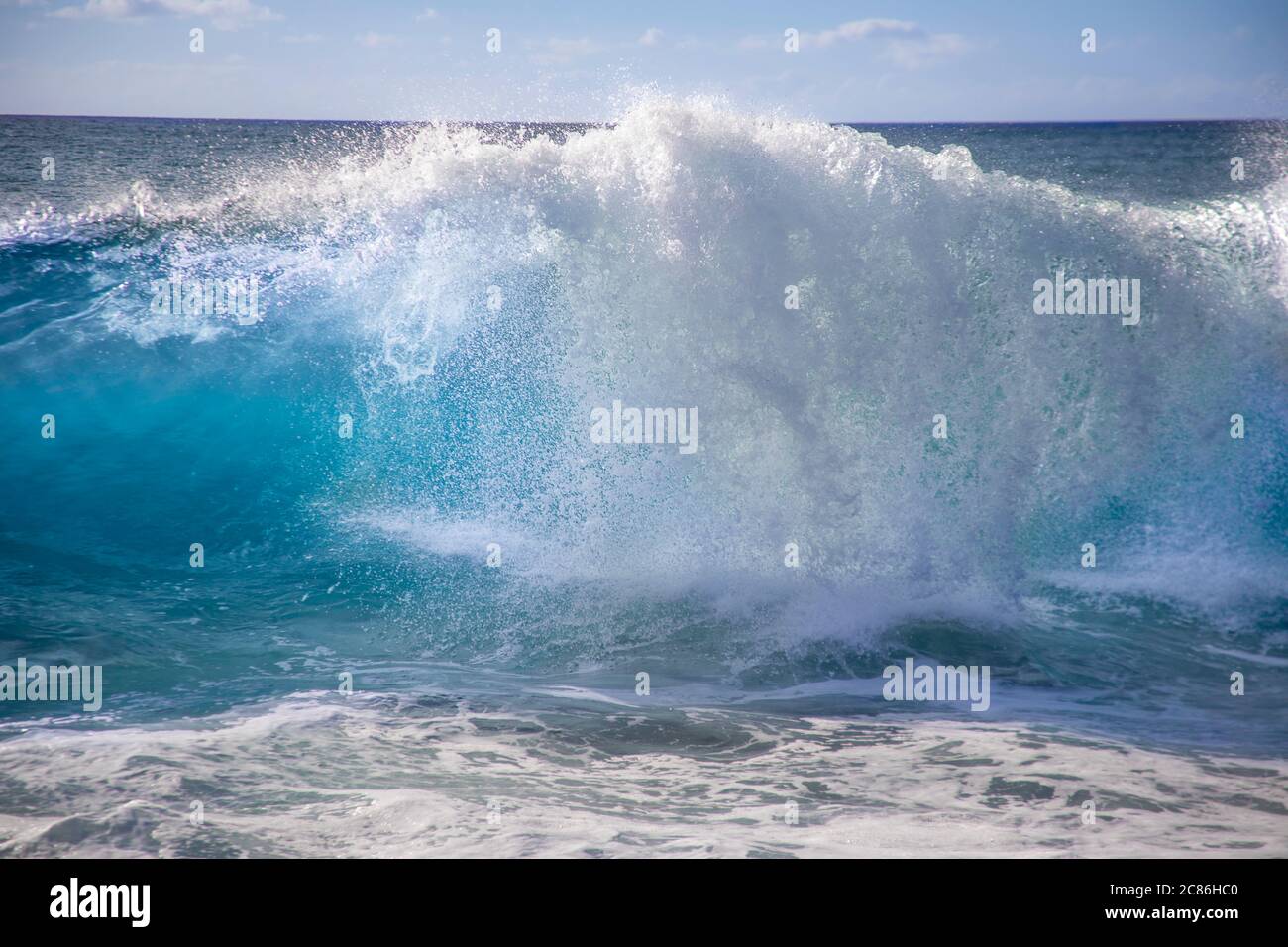 The backwash of a wave hits a second pulse causing it to stand straight ...