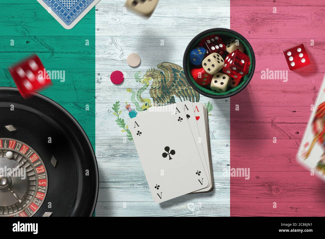 Mexico casino theme. Aces in poker game, cards and chips on red table ...