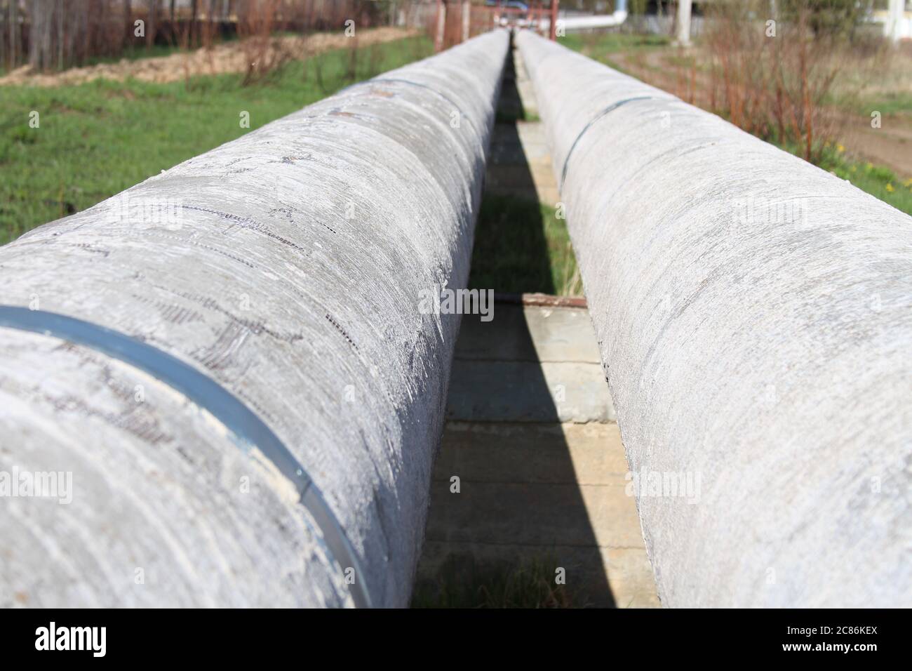 Two horizontal large diameter metal pipes. isolated and painted. Gas ...