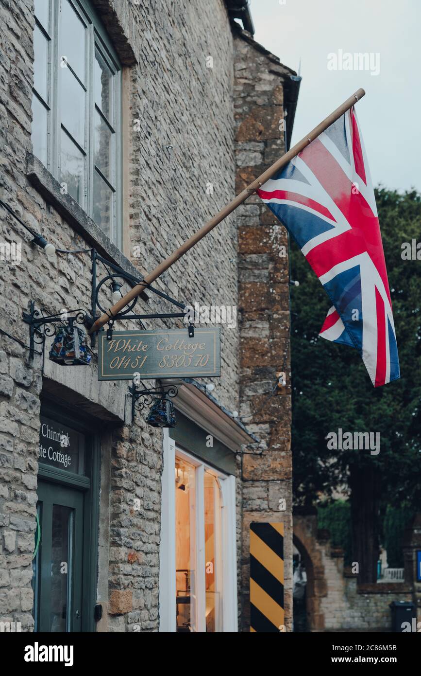 Stow-on-the-Wold, UK - July 6, 2020: Union Jack flag on the facade of a ...
