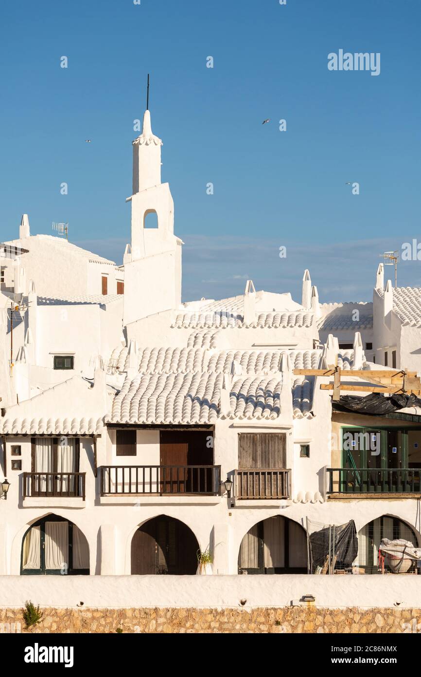 Traditional whitewash bell tower in the fishing village of Binibeca ...
