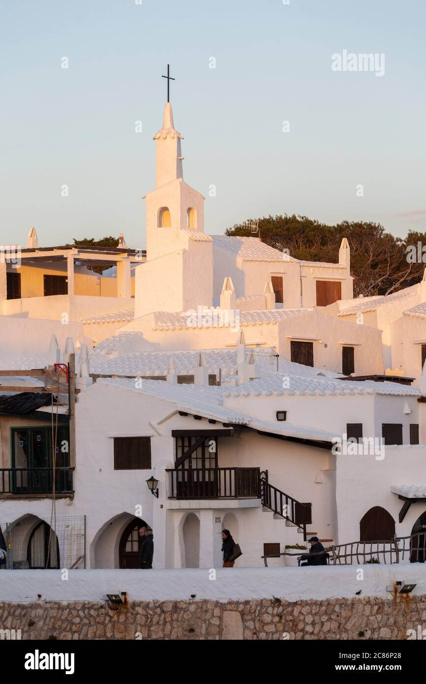 Traditional whitewash bell tower in the fishing village of Binibeca ...