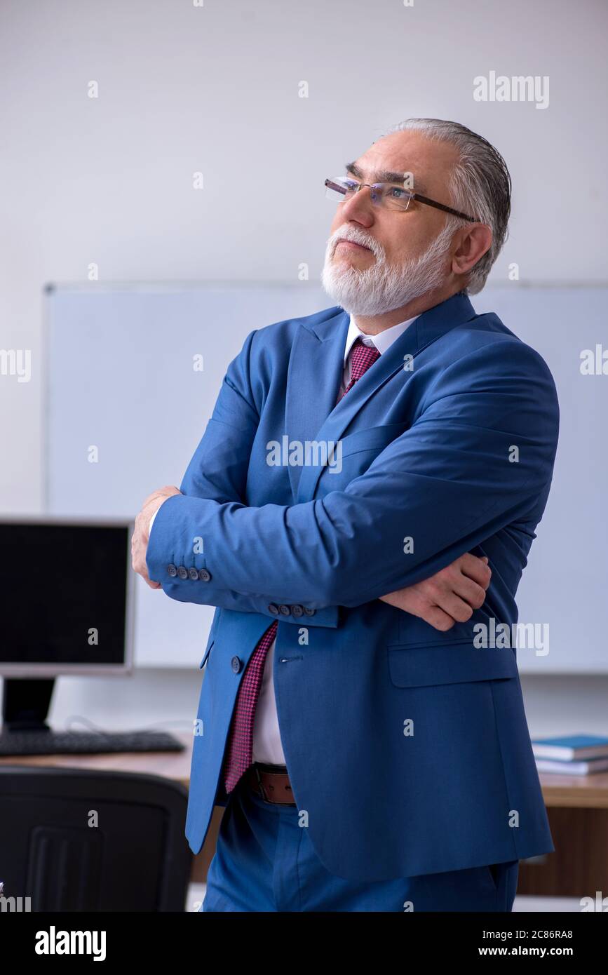 Male boss employee working in the office Stock Photo - Alamy