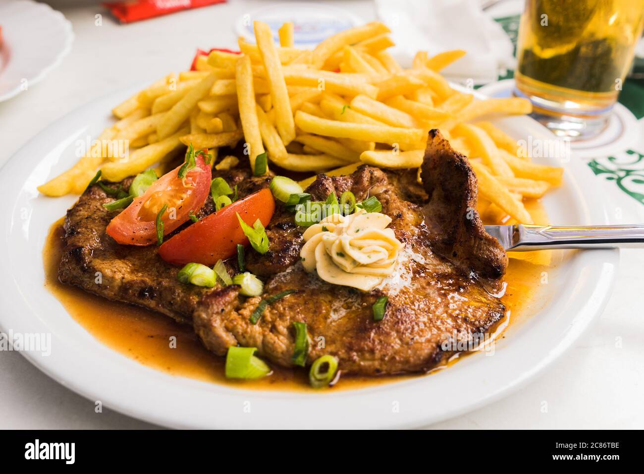 A beef steak with french fries Stock Photo - Alamy