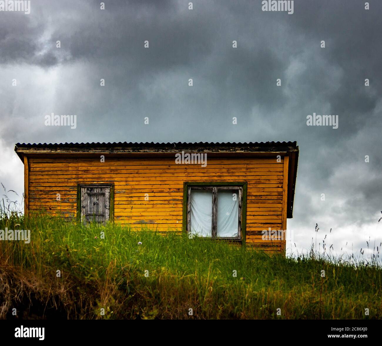 Wooden garden house on an overcast summer day Stock Photo - Alamy