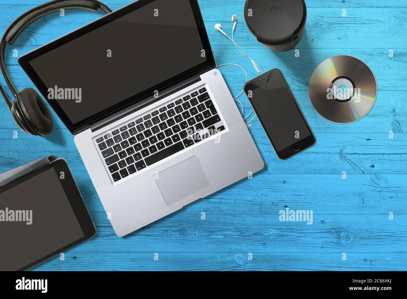 Somalia flag on national background wooden table. Portable devices ...