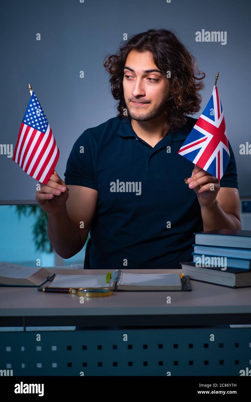 Young student in the classroom at night Stock Photo - Alamy