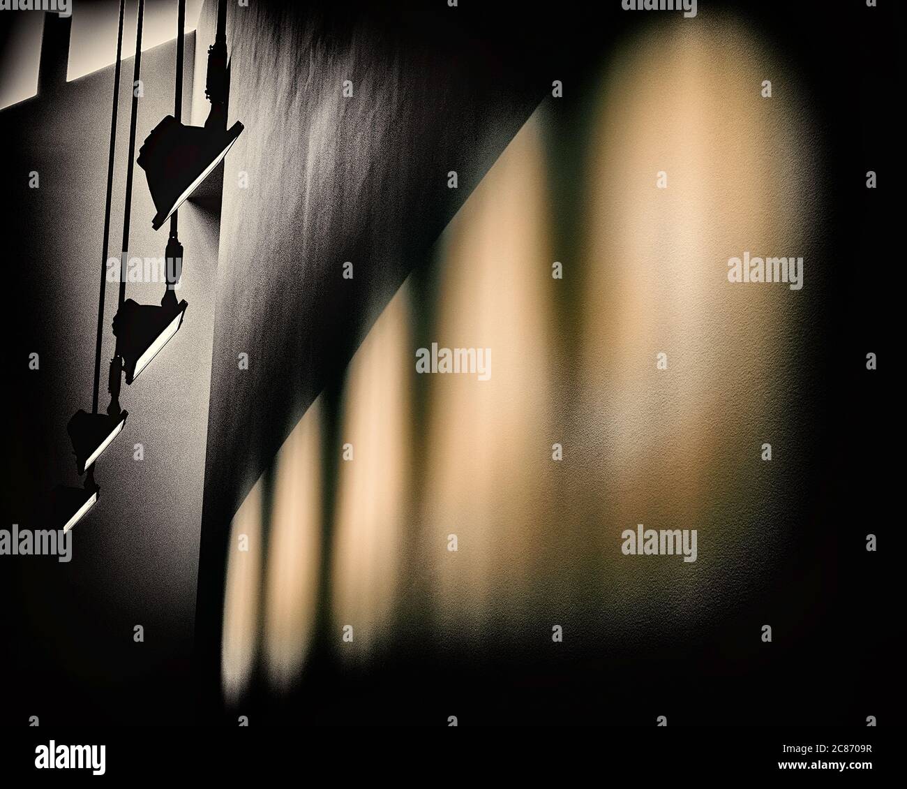 Gallery Wall illuminated by hanging Lights Stock Photo - Alamy