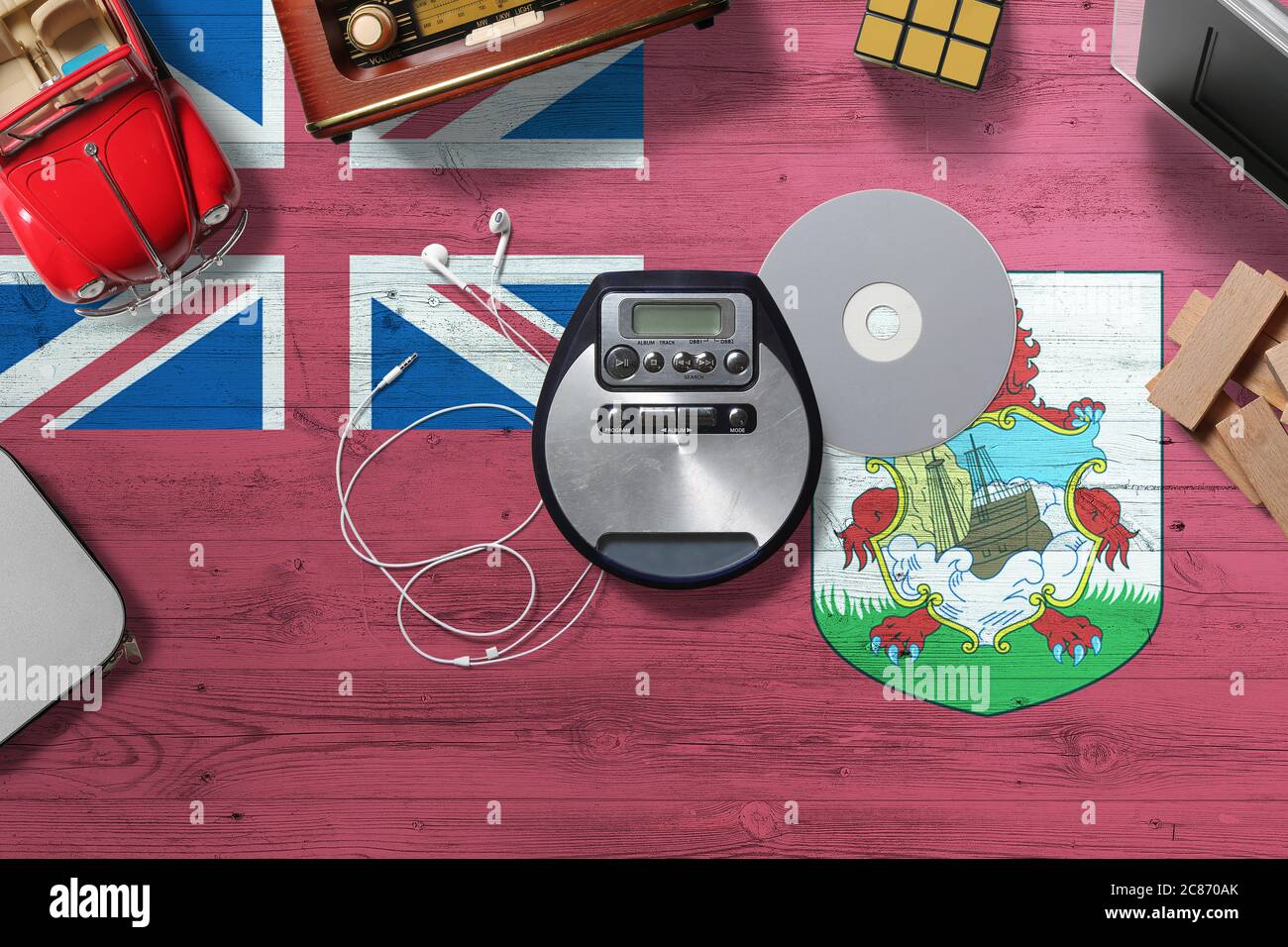 Bermuda flag on wooden desk with retro digital media concept. National ...