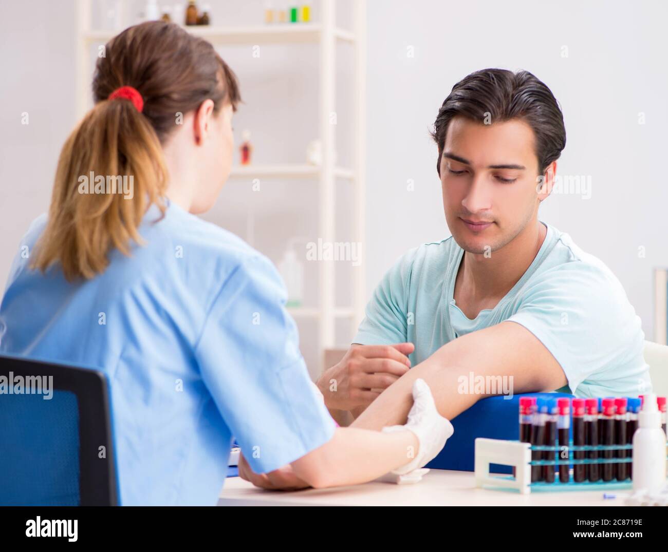 The young patient during blood test sampling procedure Stock Photo - Alamy