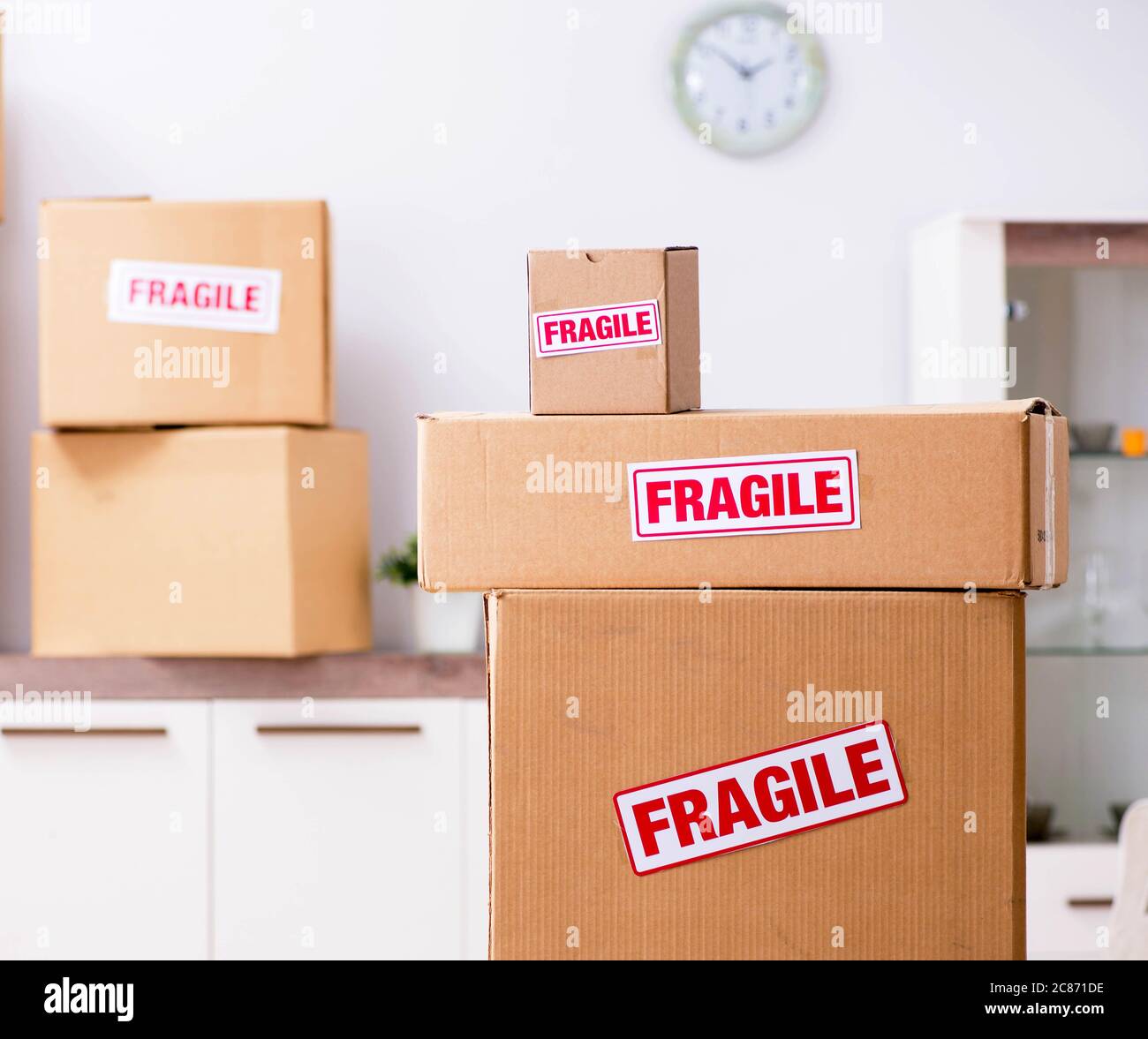 The transportation contractor with fragile boxes Stock Photo - Alamy