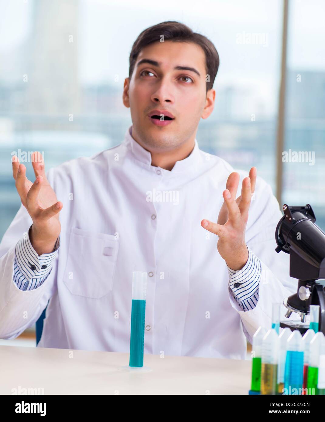 Magician in chemical laboratory hi-res stock photography and images - Alamy