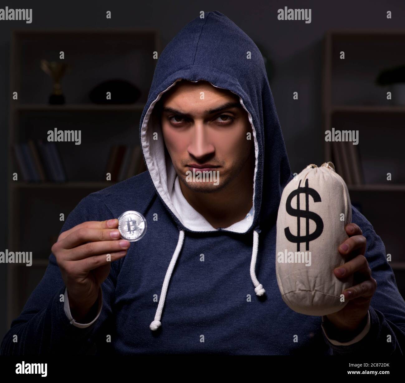 The young man in bitcoin mining concept Stock Photo - Alamy