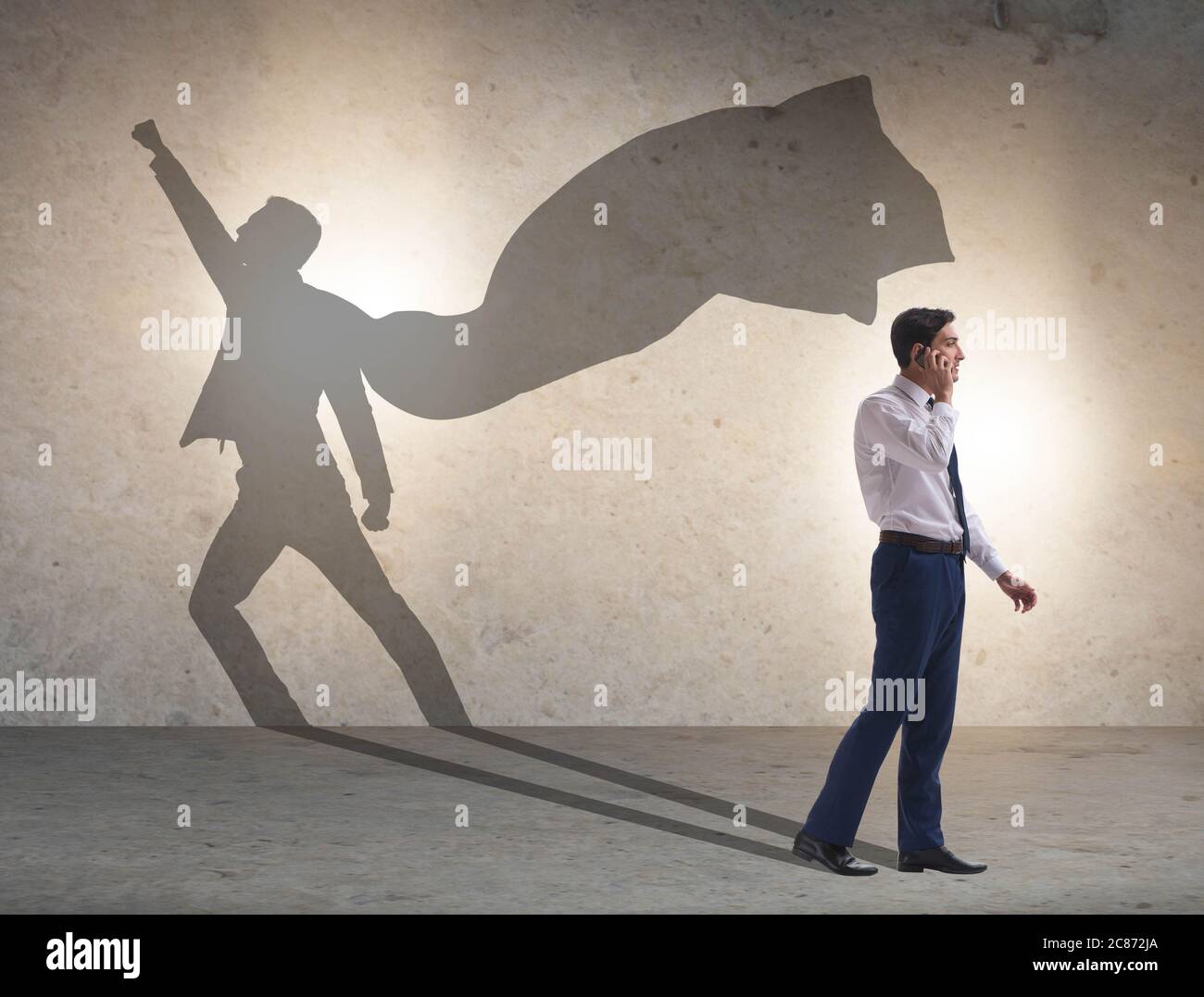 The businessman and his shadow in business concept Stock Photo - Alamy