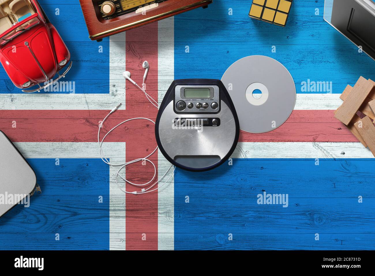 Iceland flag on wooden desk with retro digital media concept. National ...
