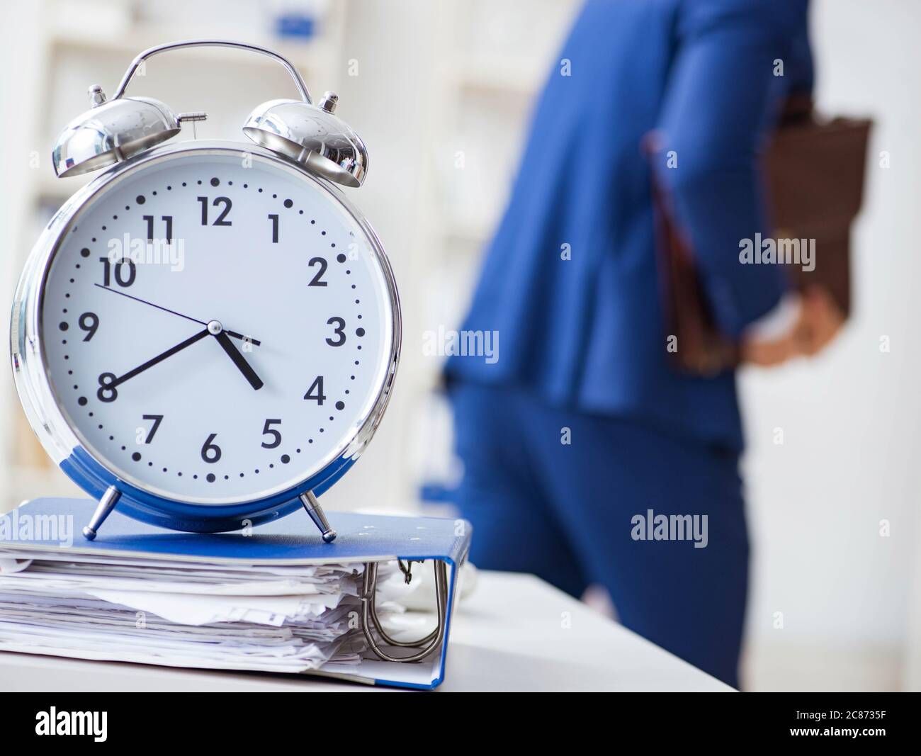 The businessman in bad time management concept Stock Photo - Alamy