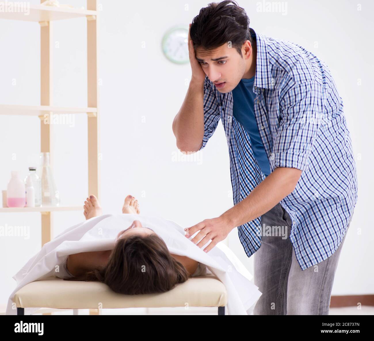 The man mourning his dead wife Stock Photo - Alamy