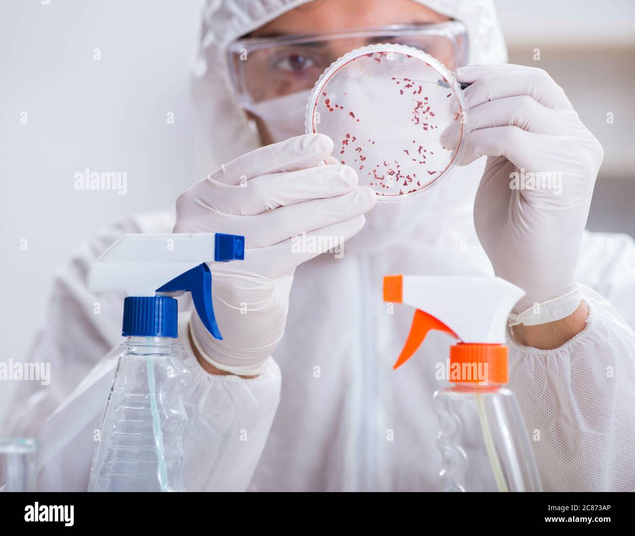 The chemist testing chemical substances in lab Stock Photo - Alamy
