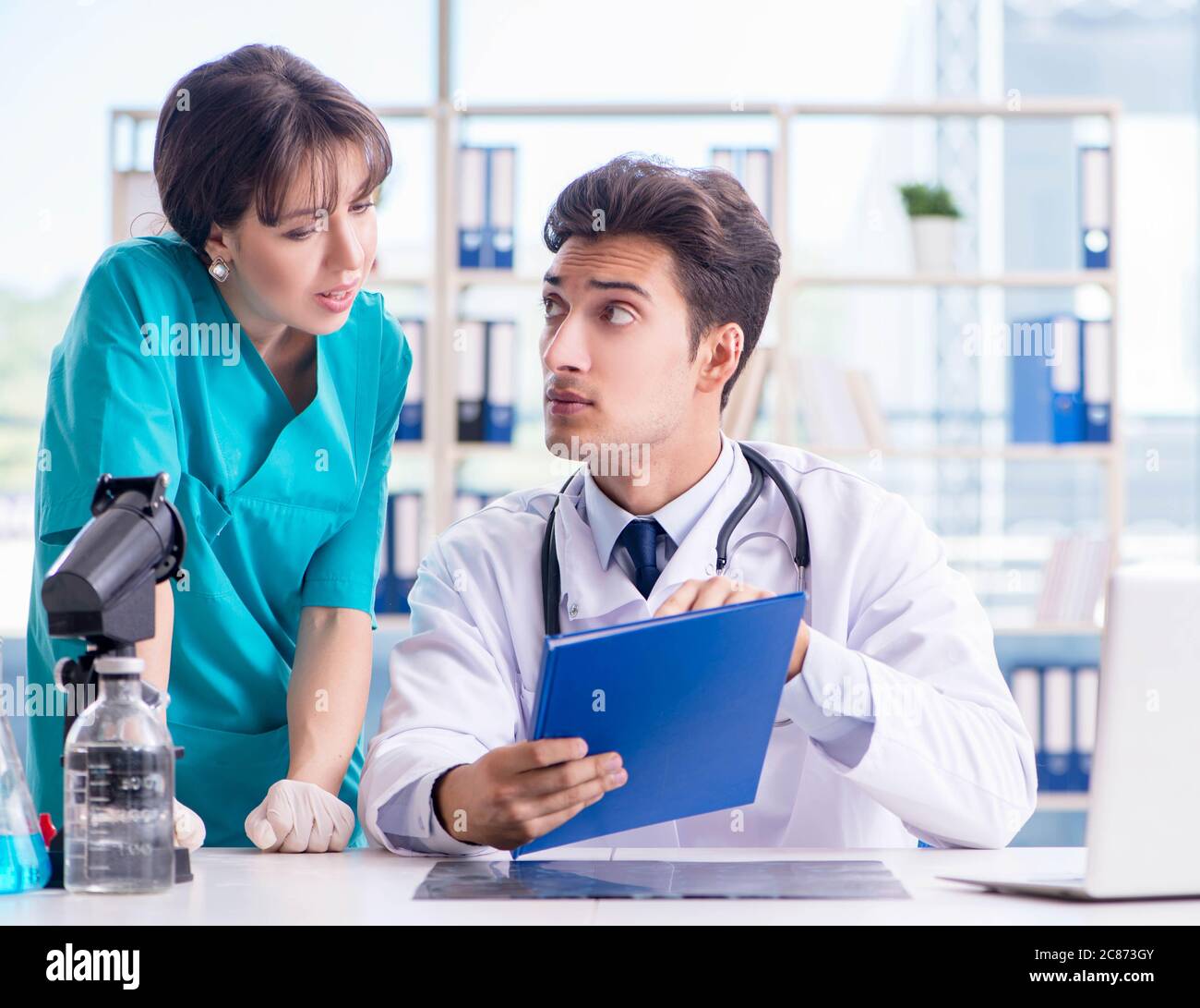 The two doctors in the hospital Stock Photo - Alamy