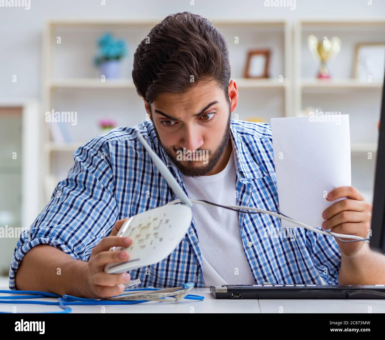 Frustrated computer manual hi-res stock photography and images - Alamy