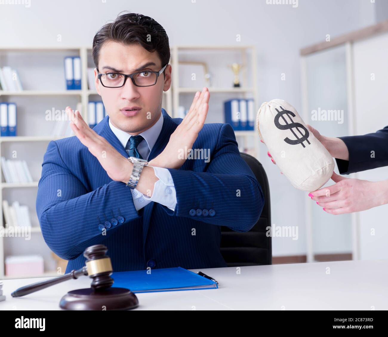 The judge in bribe concept with money Stock Photo - Alamy