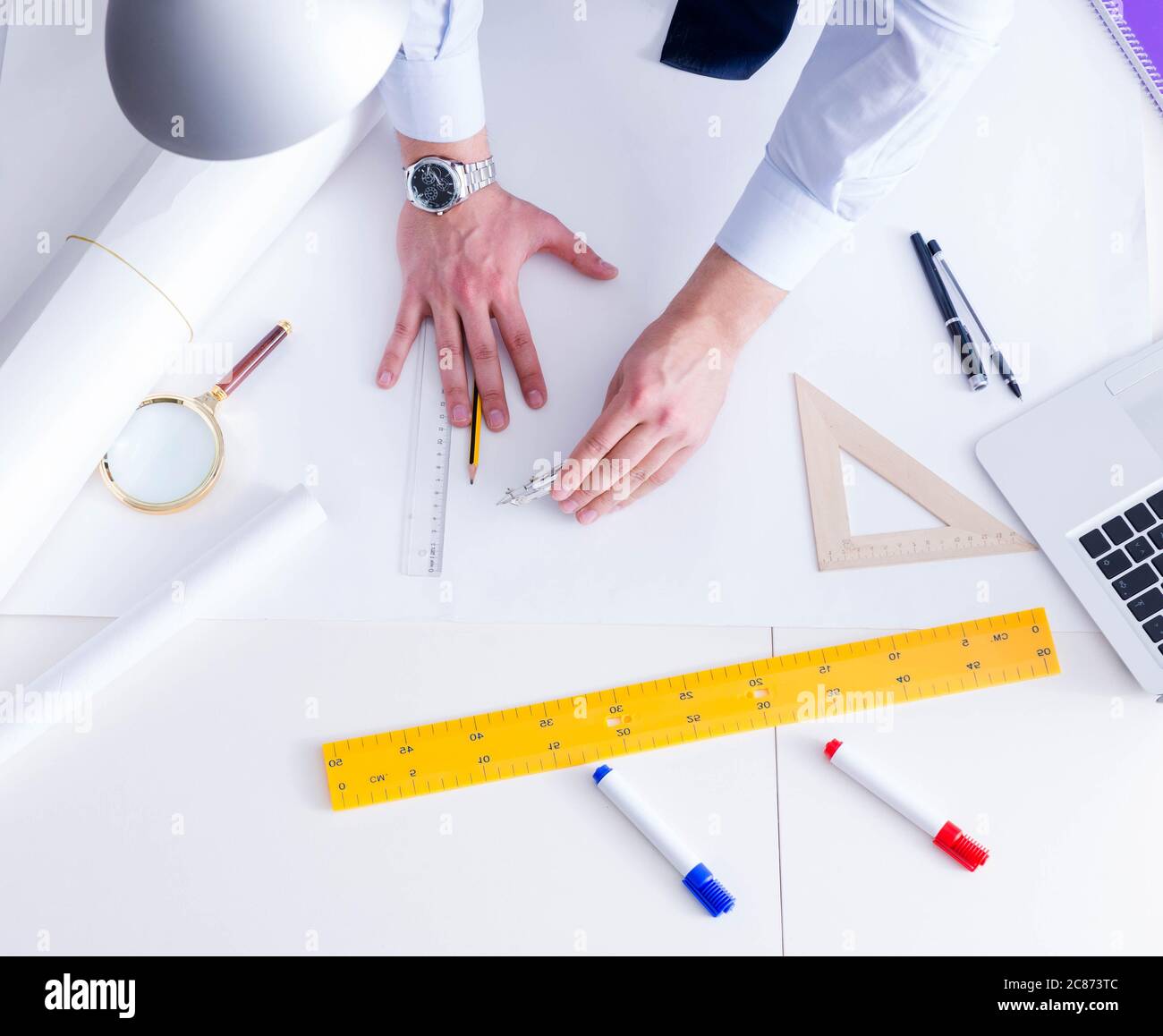 The engineer working on new project drawings Stock Photo - Alamy