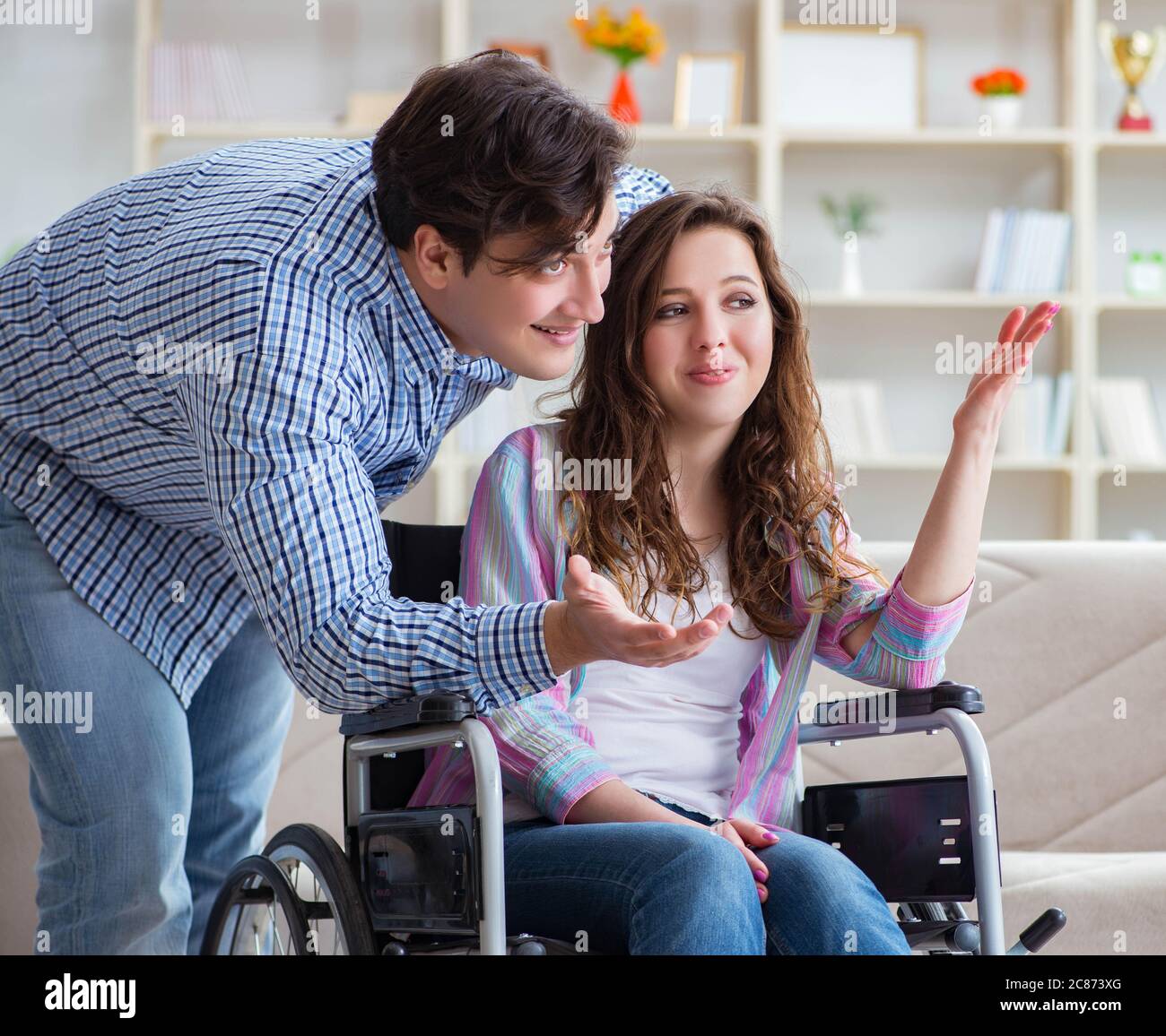 The young family taking care of each other Stock Photo - Alamy