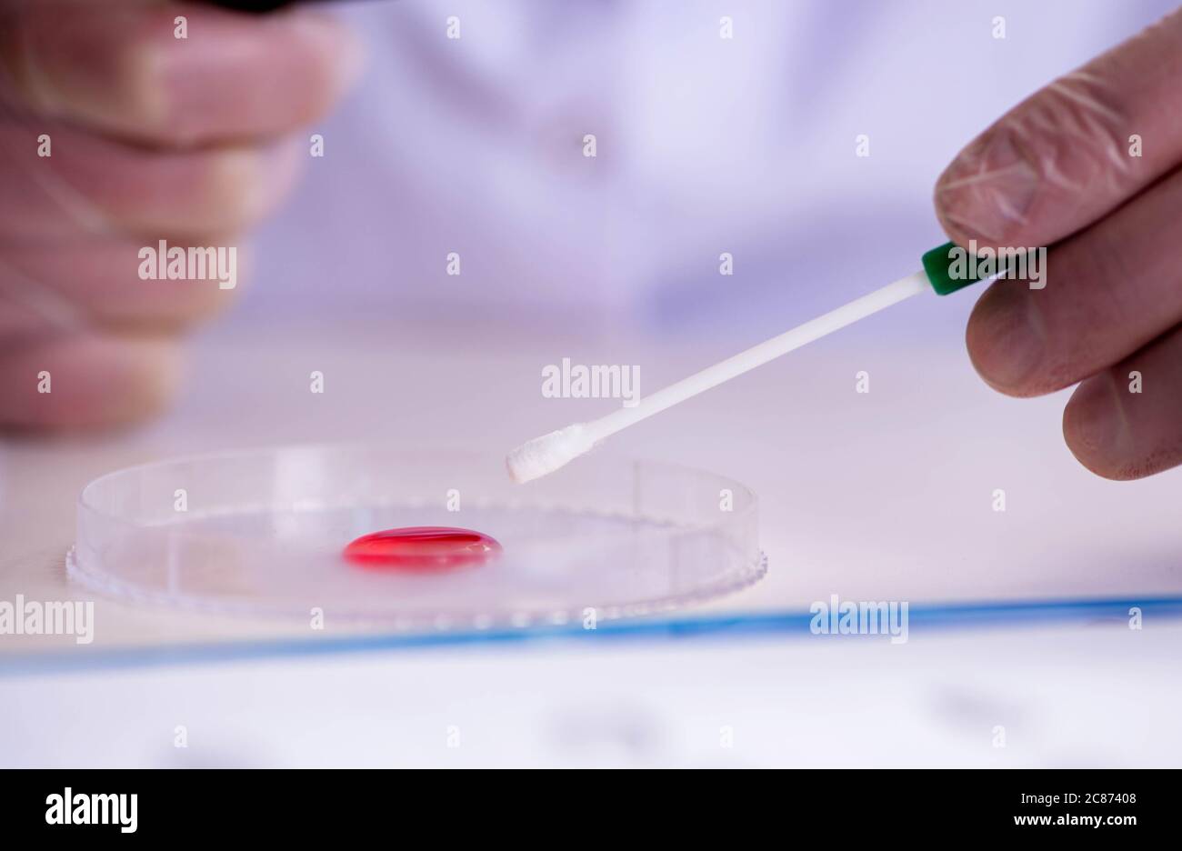 The drug synthesis lab experimentnig with pills Stock Photo - Alamy