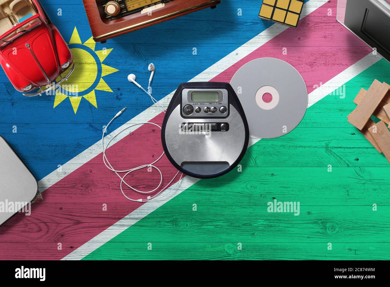 Namibia flag on wooden desk with retro digital media concept. National ...