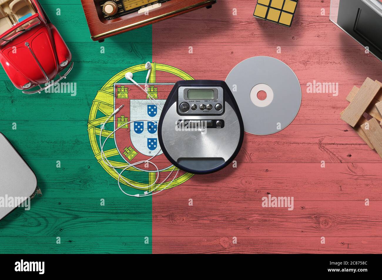 Portugal flag on wooden desk with retro digital media concept. National ...