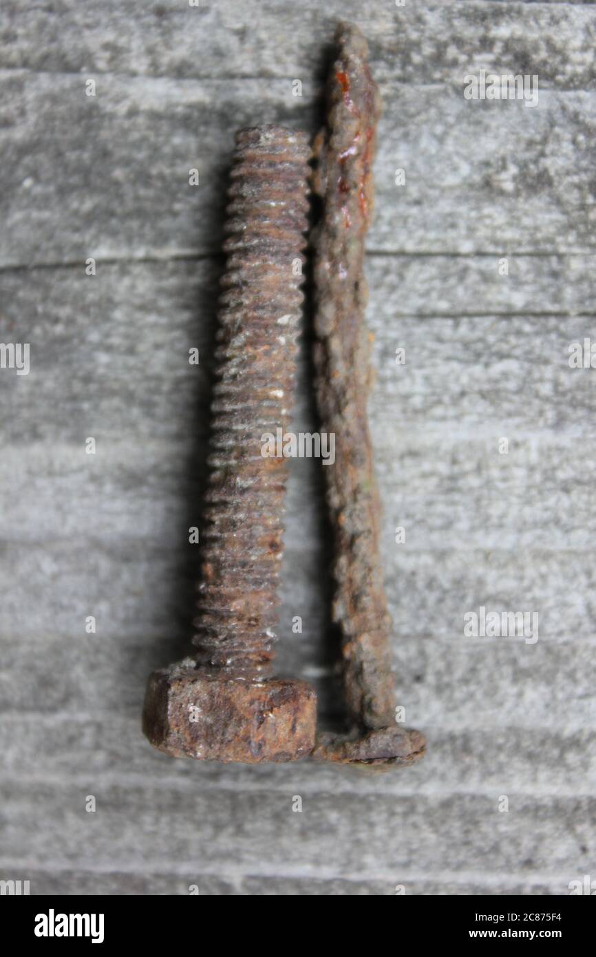 One pair of severely weathered rusted iron construction nails Stock ...