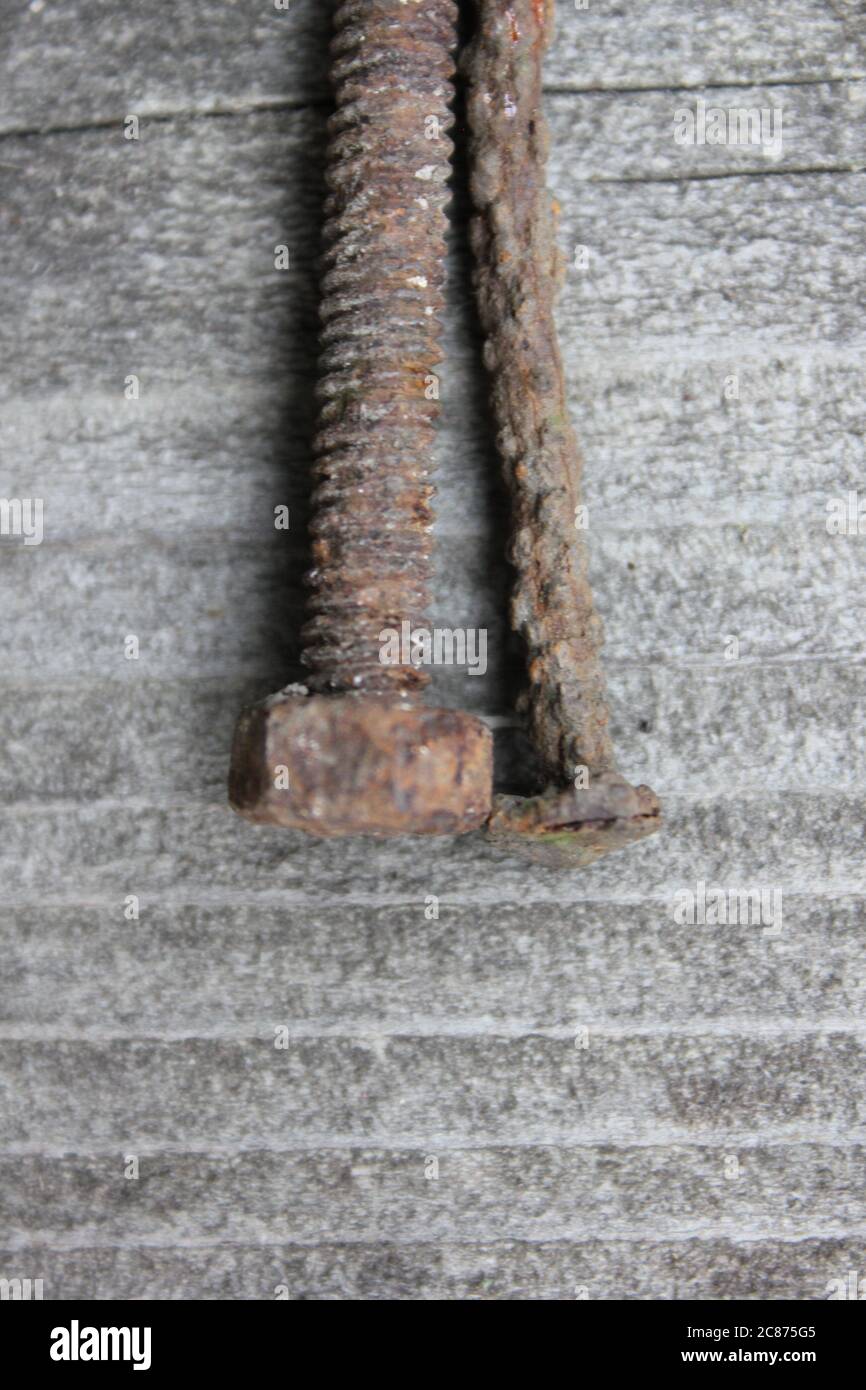 One pair of severely weathered rusted iron construction nails Stock ...