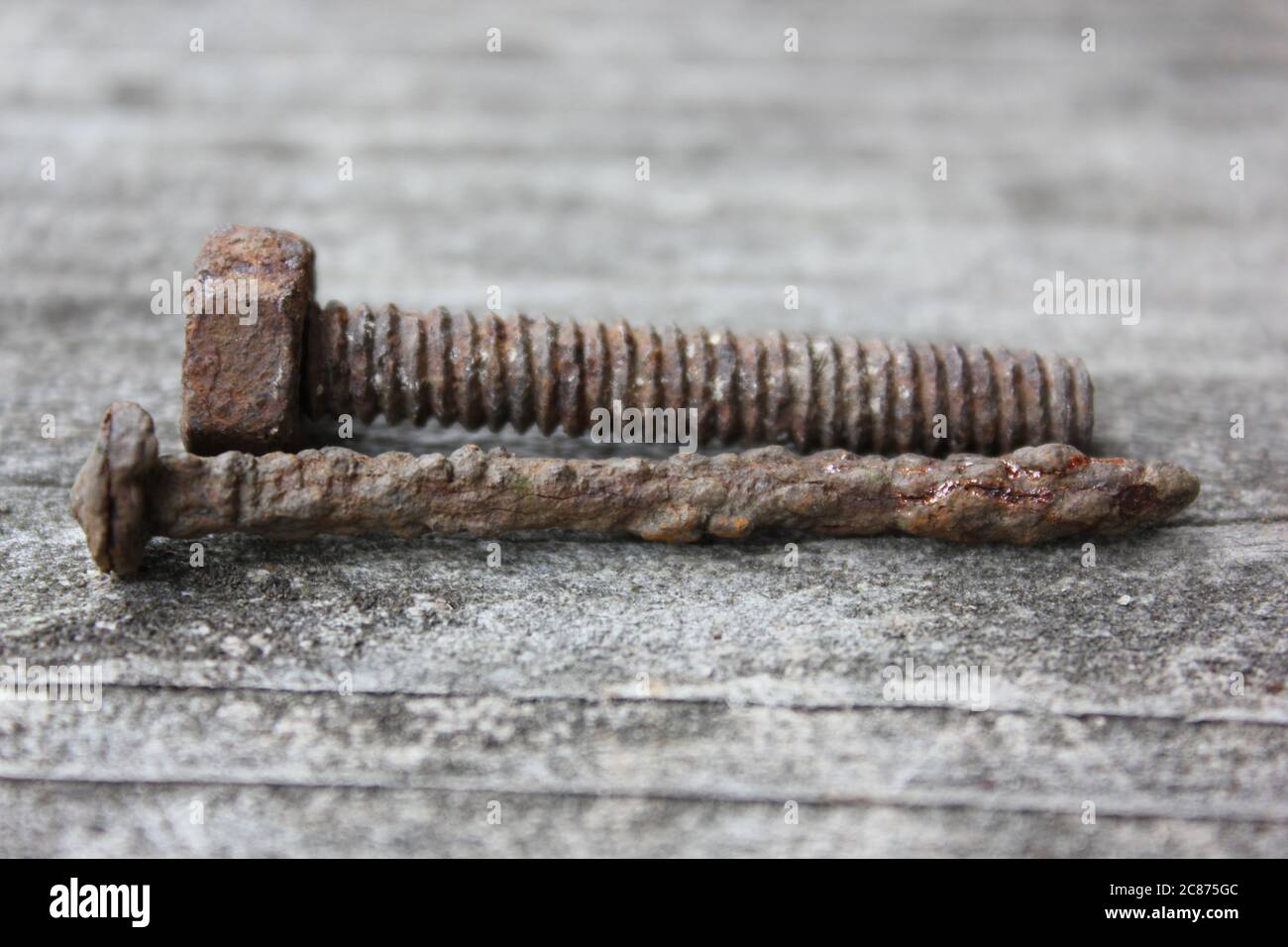 One pair of severely weathered rusted iron construction nails Stock ...