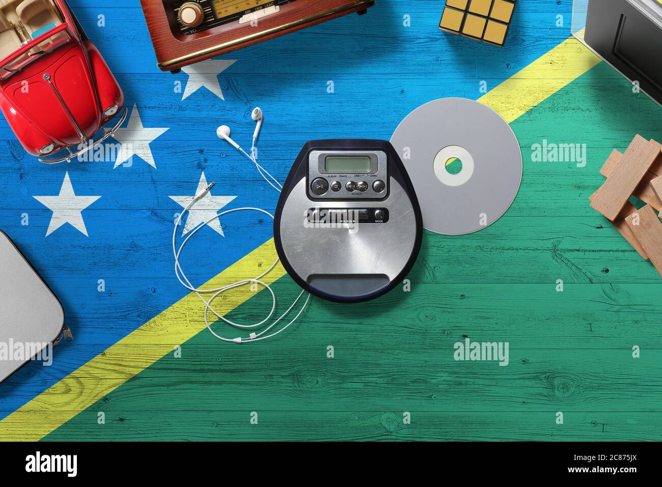 Solomon Islands flag on wooden desk with retro digital media concept ...