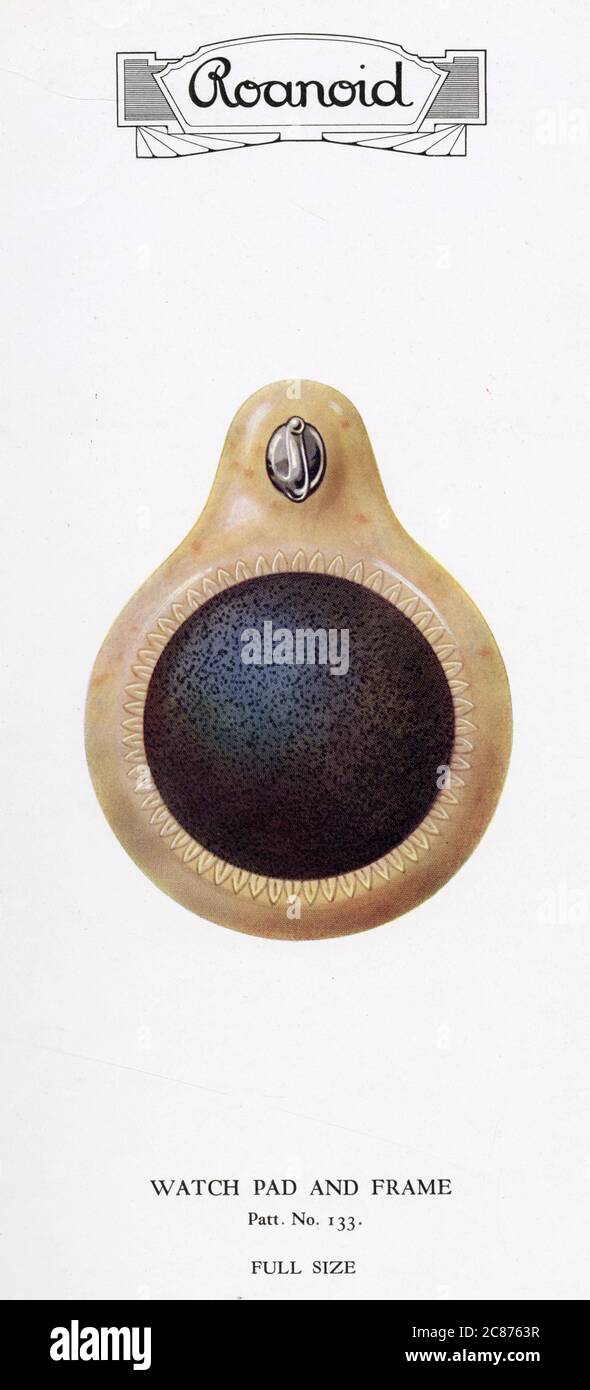 Roanoid bakelite watch pad and frame in marbled cream Stock Photo - Alamy