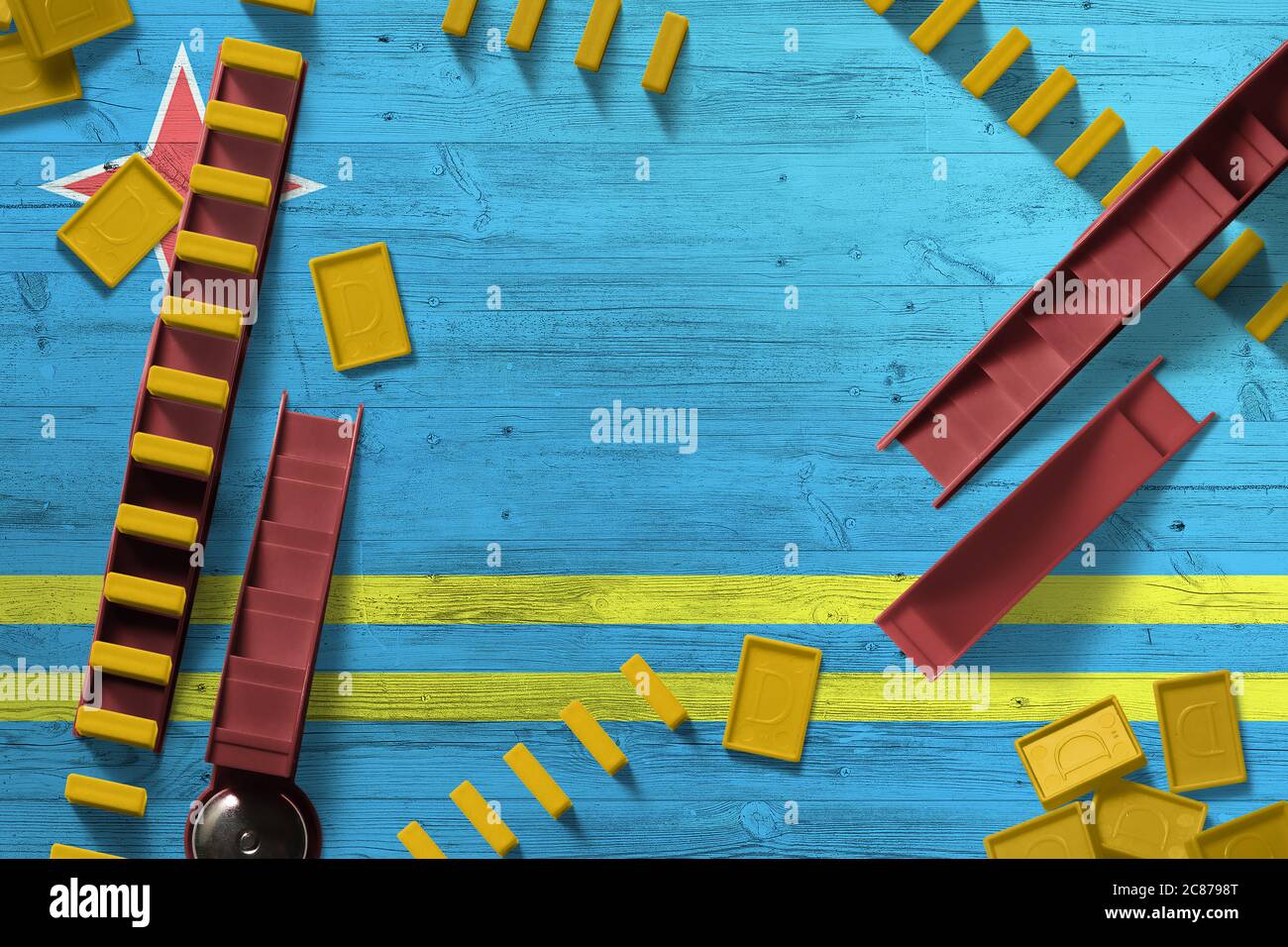 Aruba flag with national background with dominoes on wooden table. Top ...