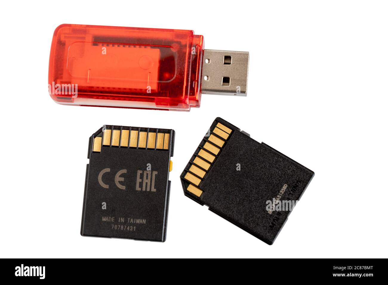 Multi card USB reader adapter with two SD cards isolated on white ...