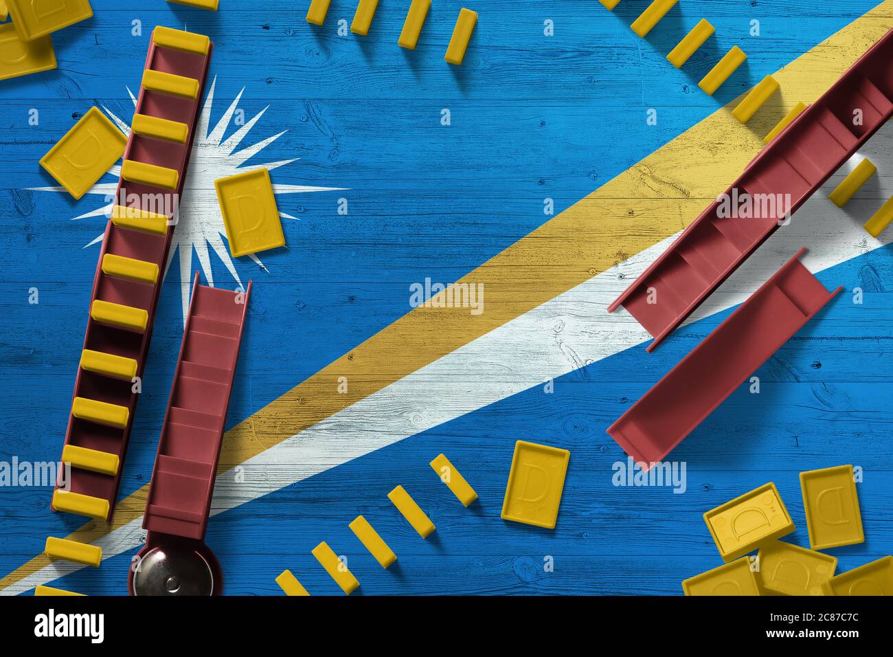 Marshall Islands flag with national background with dominoes on wooden ...