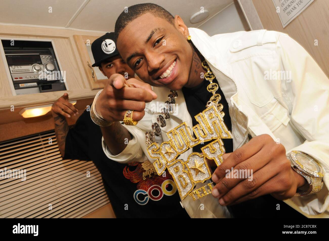 Rappers Deandre Way aka Soulja Boy Tell 'Em and Arab (L) backstage ...