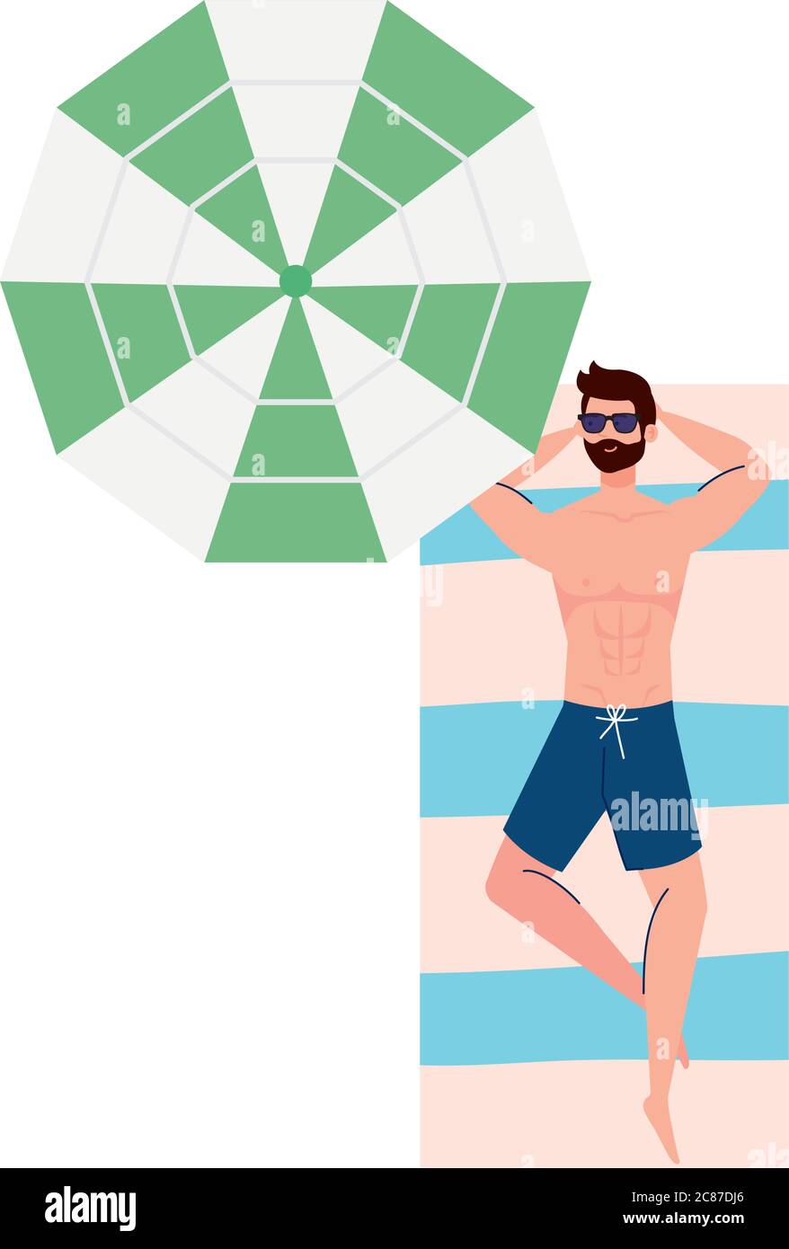 view aerial, man in shorts lying down, tanning on towel, with umbrella ...