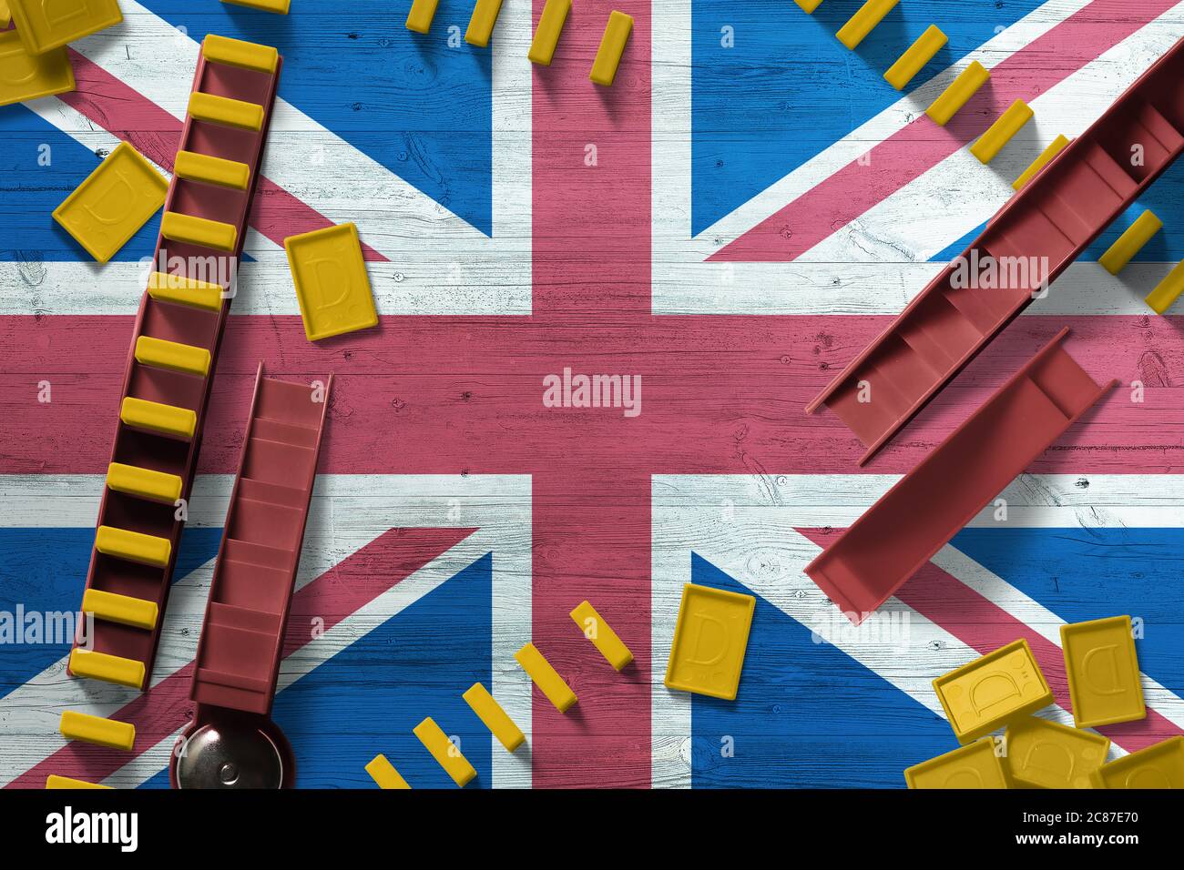 United Kingdom flag with national background with dominoes on wooden ...