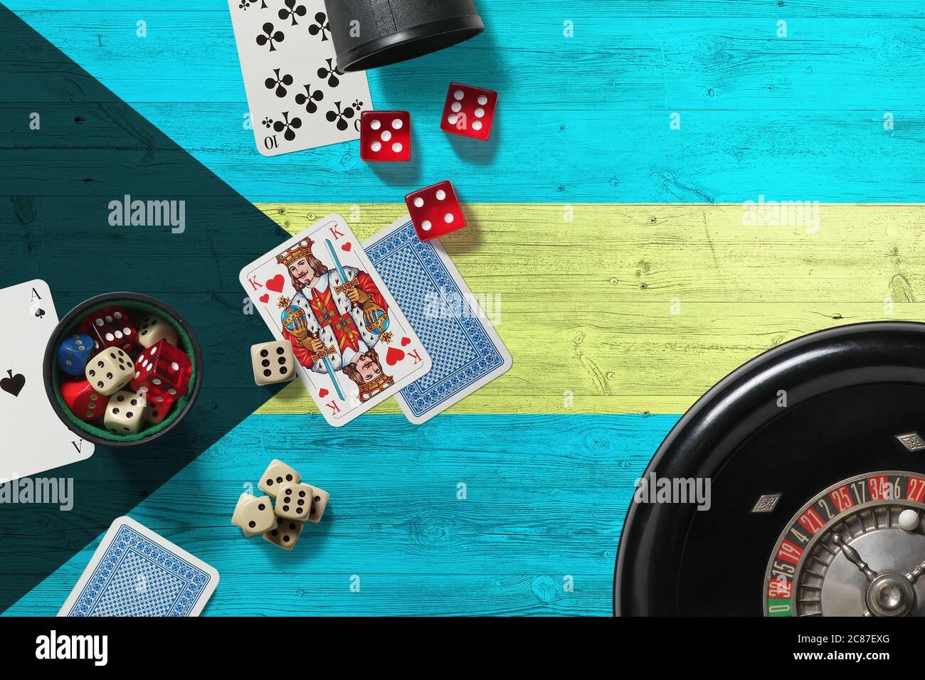 Bahamas casino theme. Aces in poker game, cards and chips on red table ...