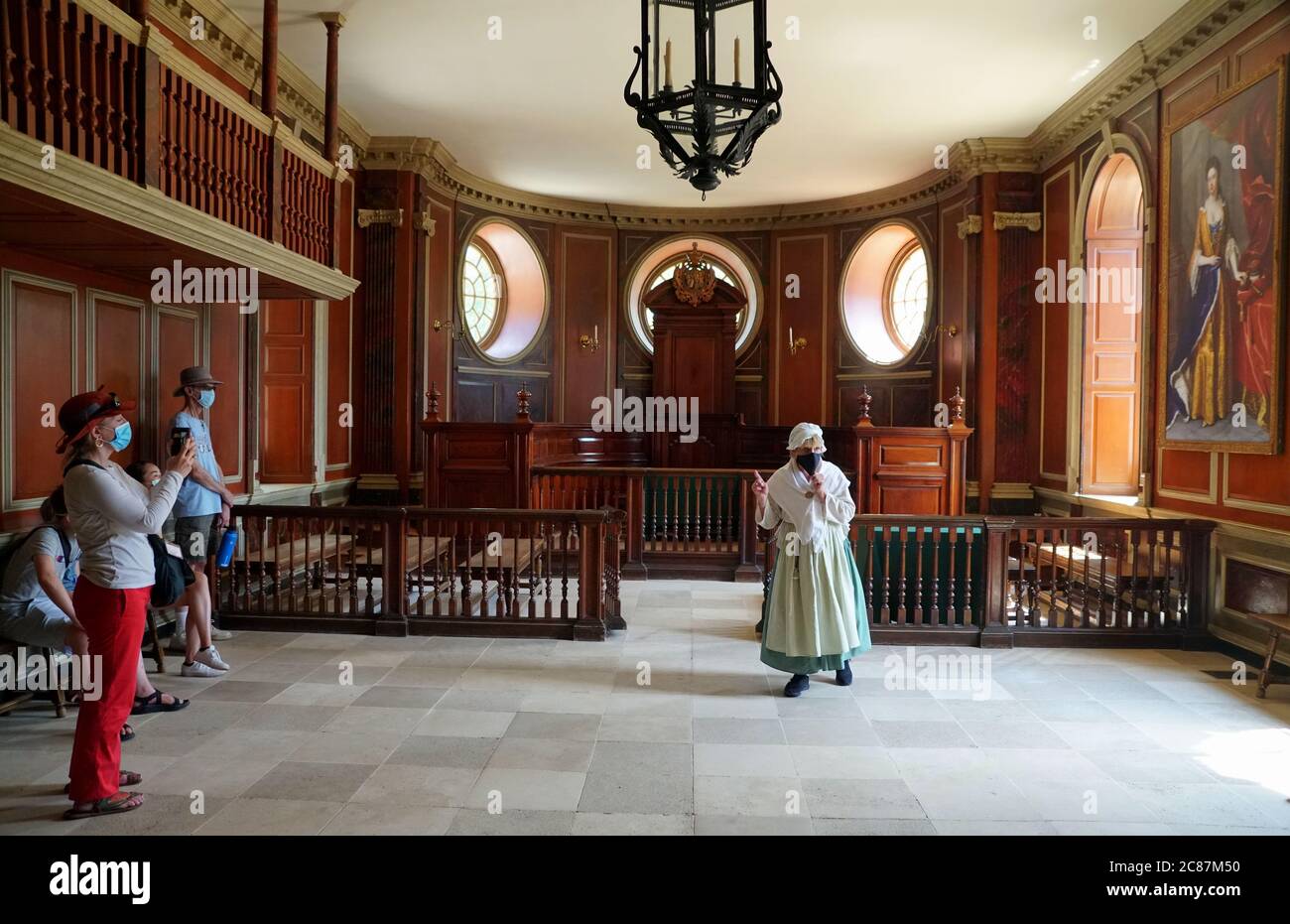 Williamsburg, Virginia, U.S.A - June 30, 2020 - The tour guide inside ...