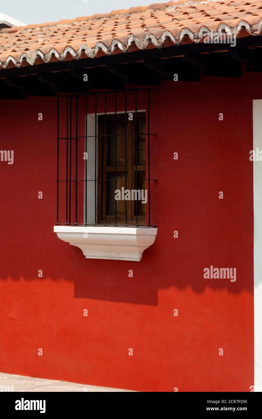 Exterior window with iron balcony in colonial style house of La Antigua ...