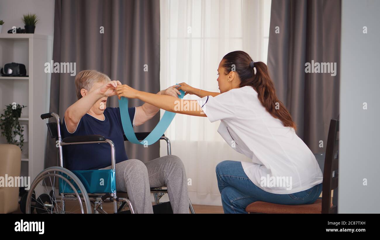 Wheelchair assistance lifting hi-res stock photography and images - Alamy