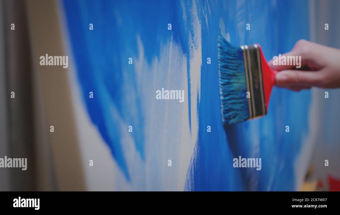 Woman with painting skill in studio Stock Photo - Alamy