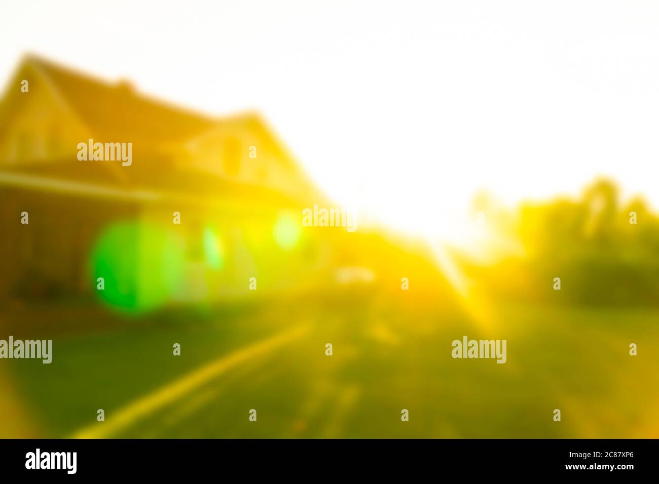 Blurred abstract background of Luxury house at the sunset. House ...