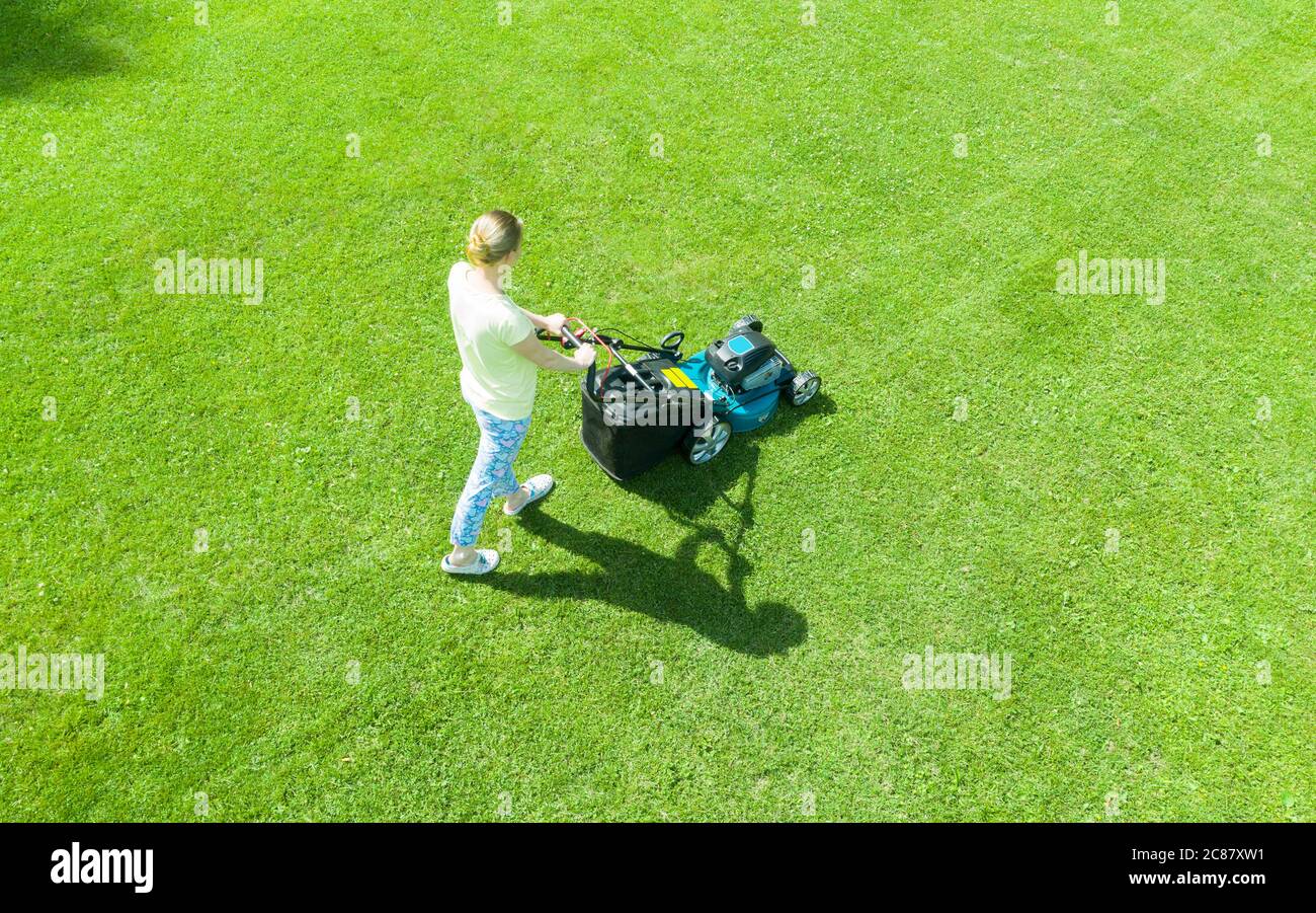 Aerial view girl mowing hi-res stock photography and images - Alamy