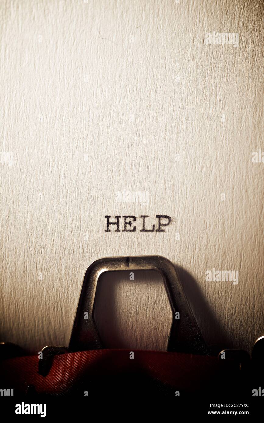 Help word written with a typewriter Stock Photo - Alamy